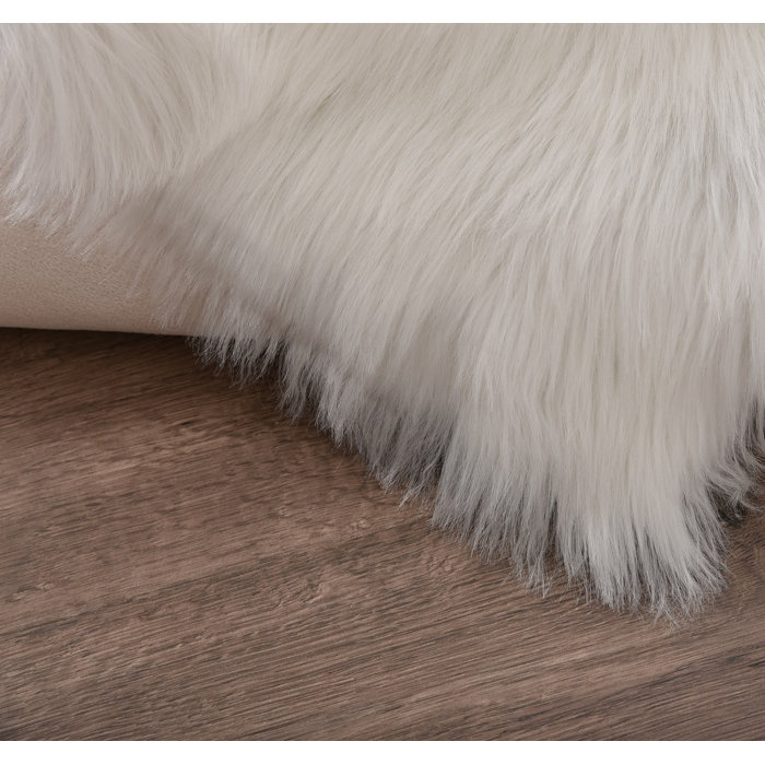 Everly Quinn Mamduh Handmade Shag Faux Sheepskin White Rug & Reviews ...