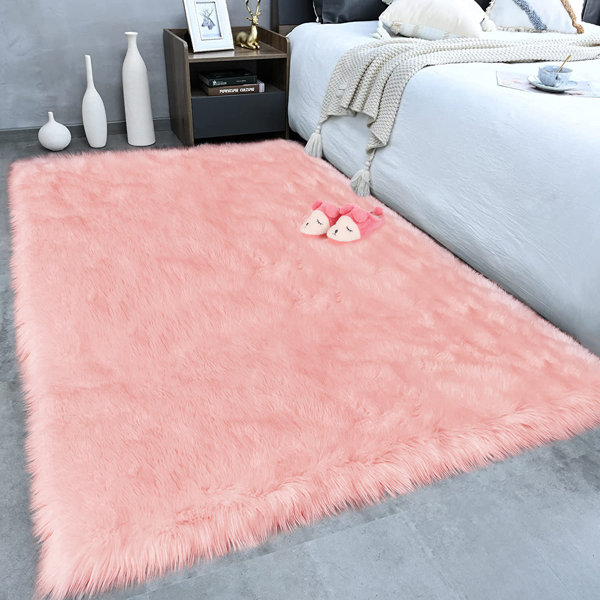 Everly Quinn Leyo Faux Sheepskin Pink Rug & Reviews | Wayfair