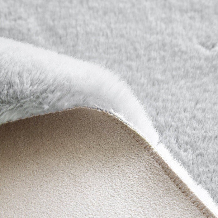 Mercer41 Khyrie Solid Color Machine Woven Shag Faux Fur Area Rug in ...