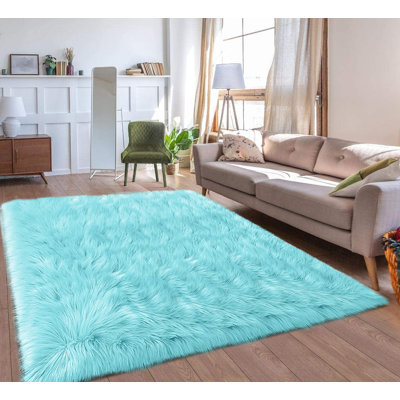 Everly Quinn Macie-Lou Handmade Faux Sheepskin Light Blue Rug & Reviews ...
