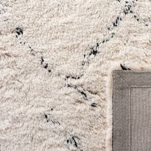 Union Rustic Powell Handmade Wool Ivory/Black Rug & Reviews | Wayfair