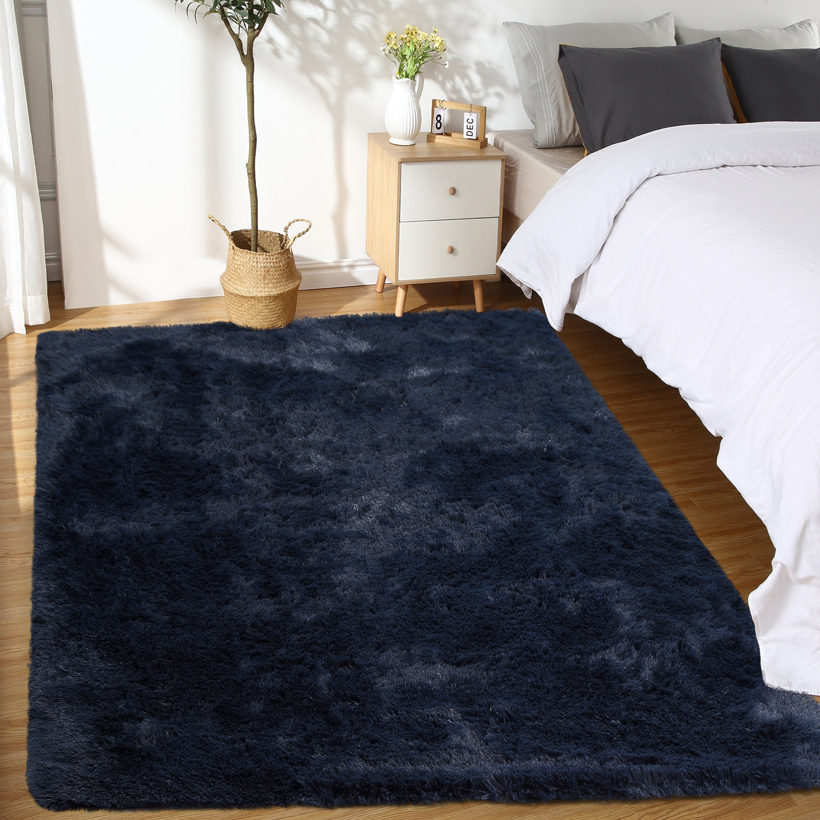 Mercer41 Kamry Machine Braided Faux Fur Navy Blue Rug & Reviews | Wayfair