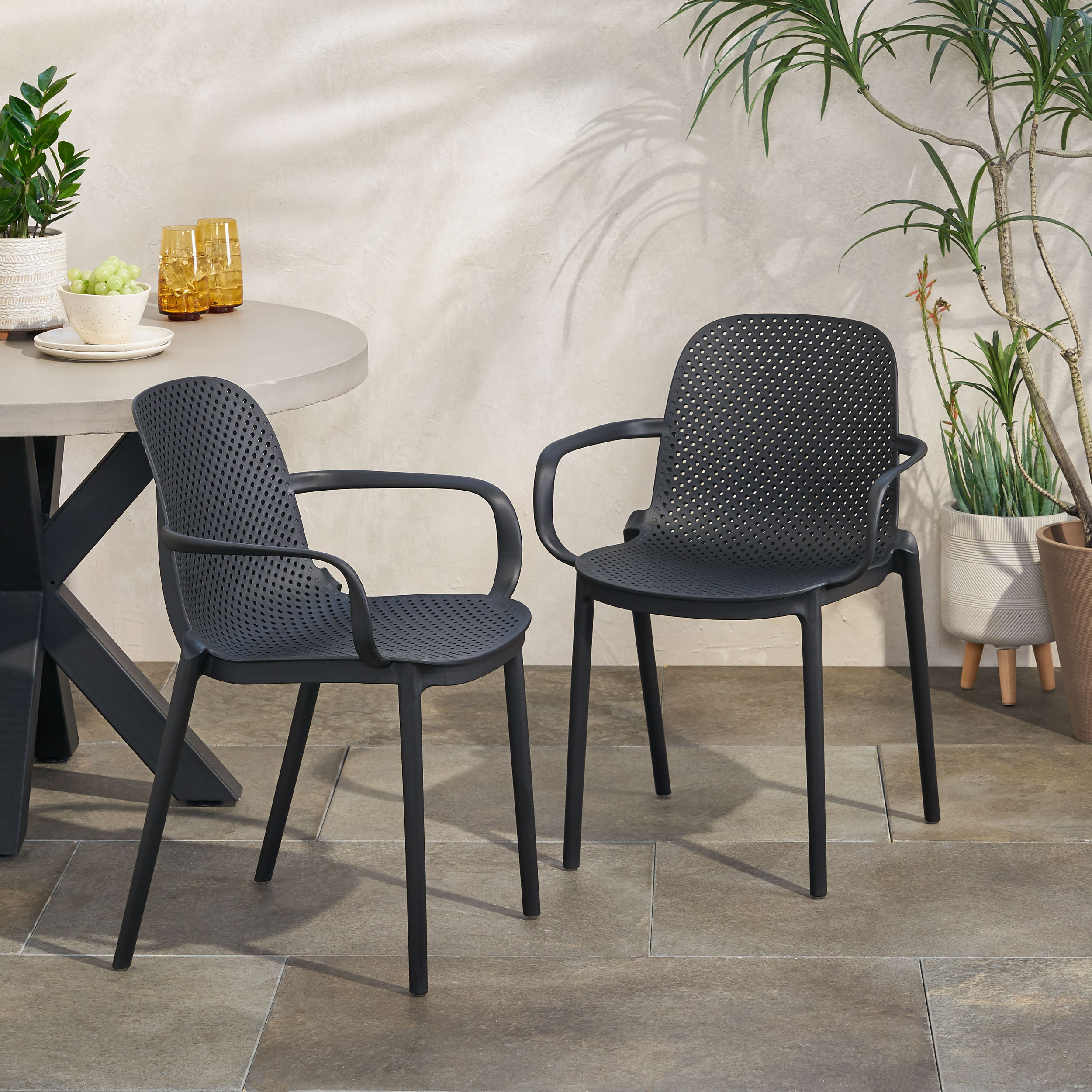 Ebern Designs Roxanne Outdoor Stacking Patio Dining Chair & Reviews ...