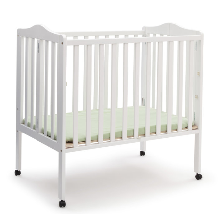 Delta Children Folding Mini Portable Crib with Mattress & Reviews | Wayfair