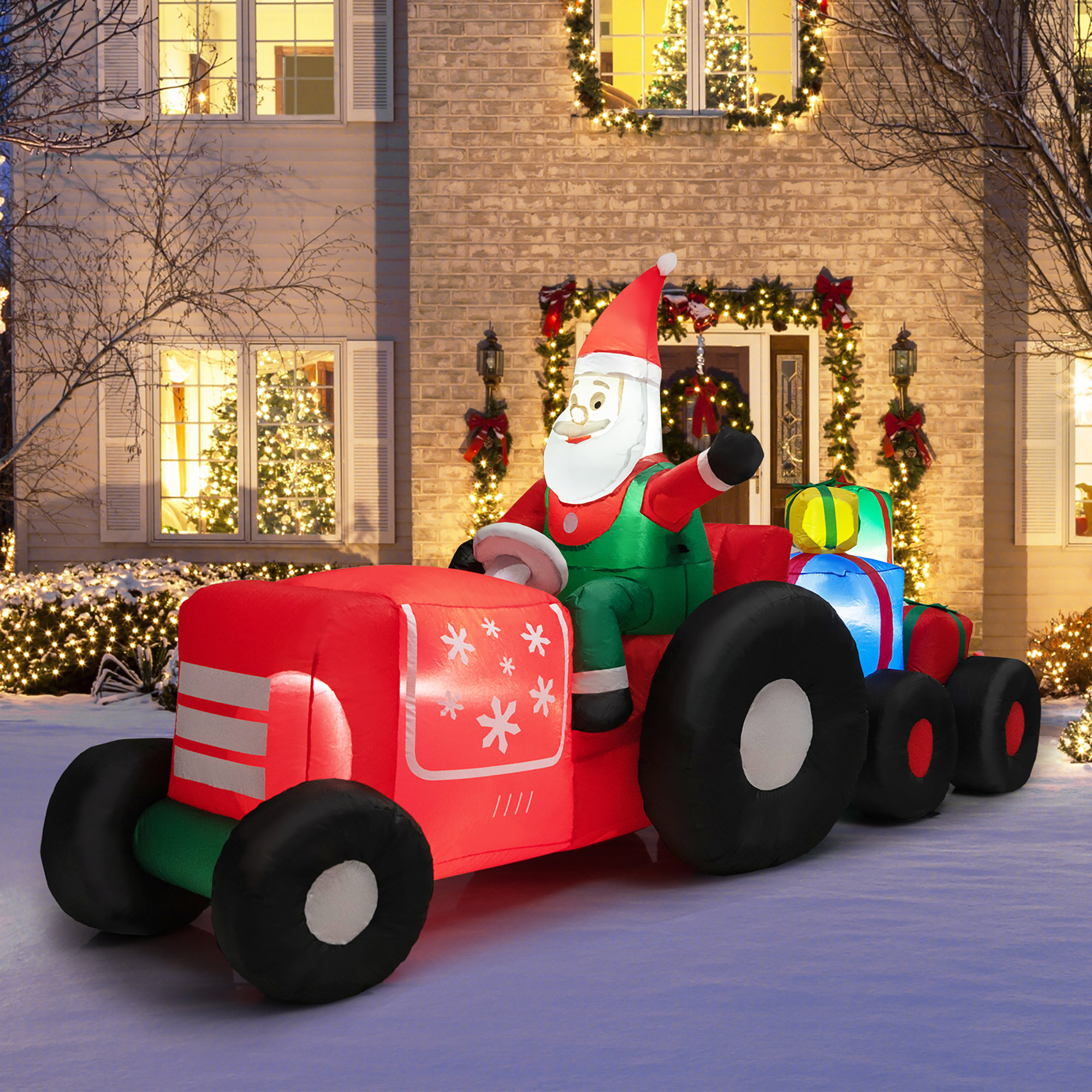 The Holiday Aisle® Santa Claus Driving Tractor Inflatable | Wayfair