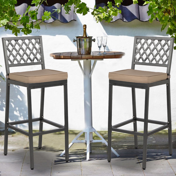 Ebern Designs Randin 40.1" Patio Bar Stool with Cushion | Wayfair