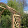 Gracie Oaks Wooden Garden Arch (Tan) With Ground Spikes | Wayfair.co.uk