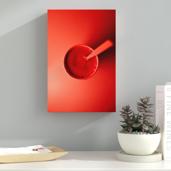 Ebern Designs Red Color Cup On A Red Background On Canvas Photograph ...