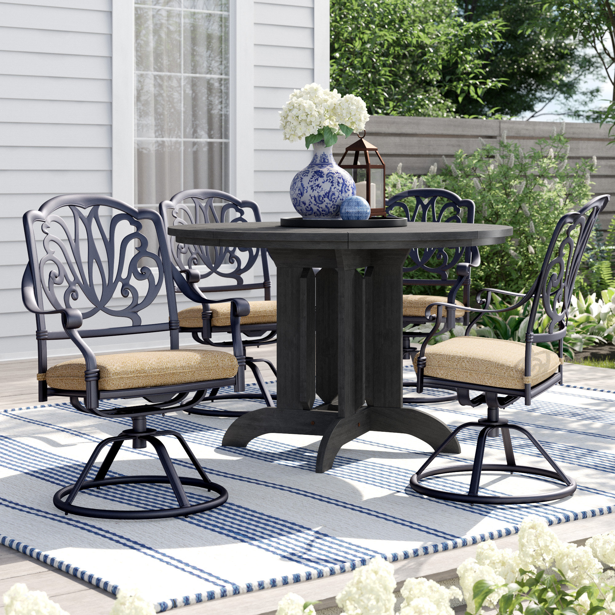 Three Posts™ Outdoor Lebanon Rocking Metal Chair with Cushions ...