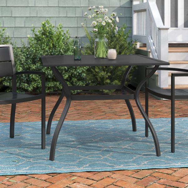 Round-resin-patio-dining-table | Wayfair