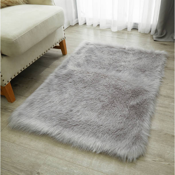 Everly Quinn Thurmont Faux Fur Pink Rug & Reviews | Wayfair