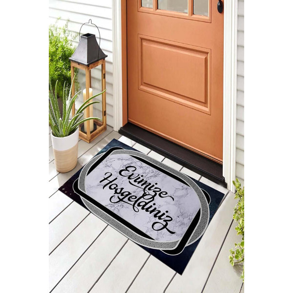 Bless international 28" x 18" Non-Slip Outdoor Door Mat | Wayfair