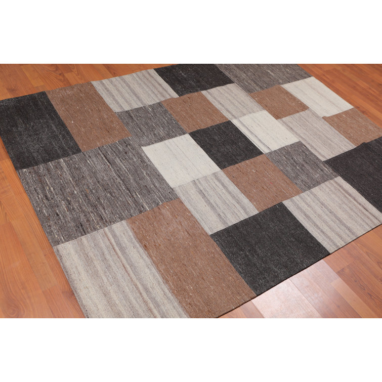 Orren Ellis Pana Handmade Flatweave Wool Earth Tones Rug | Wayfair