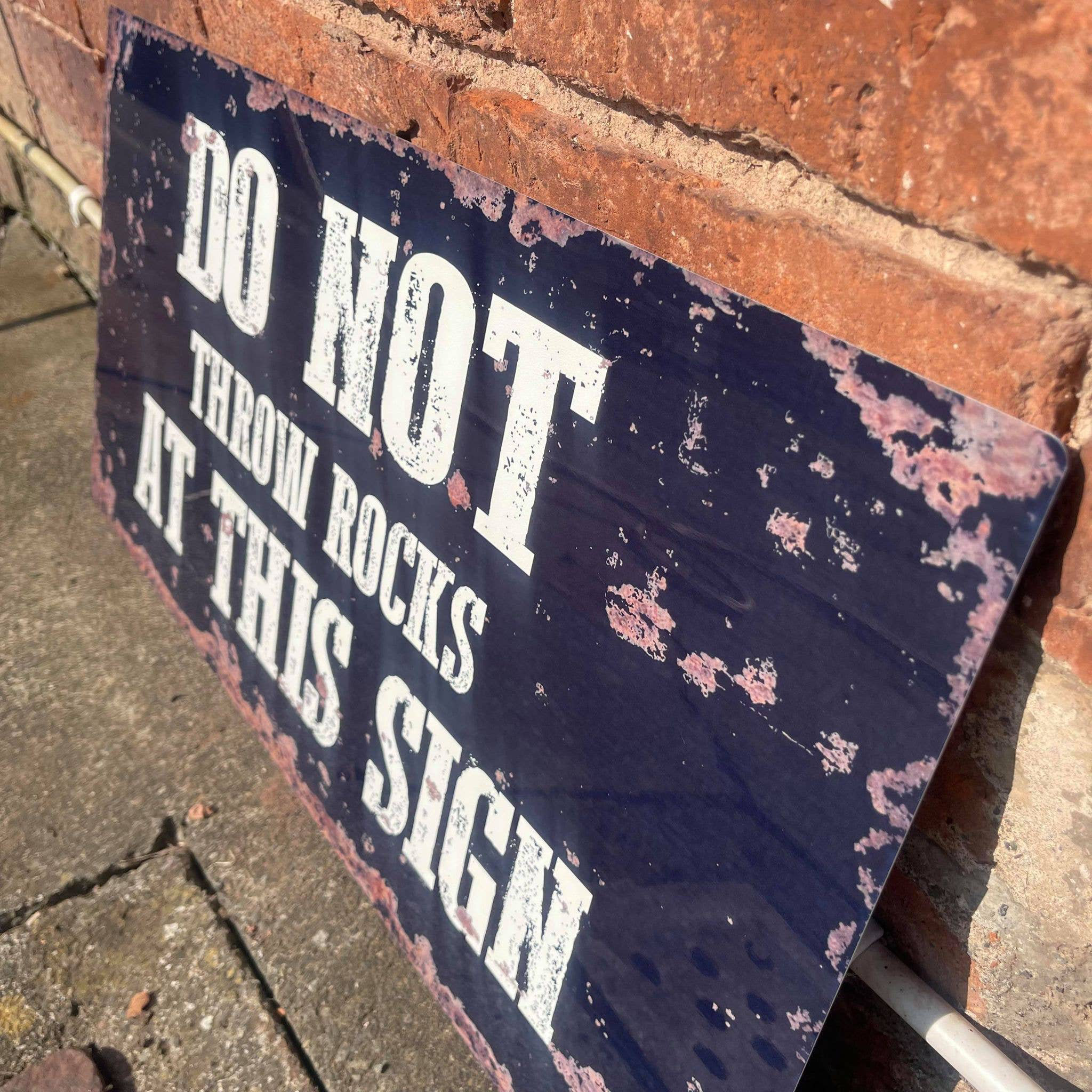 East Urban Home Do Not Throw Rocks At This Sign Metal Sign | Wayfair.co.uk