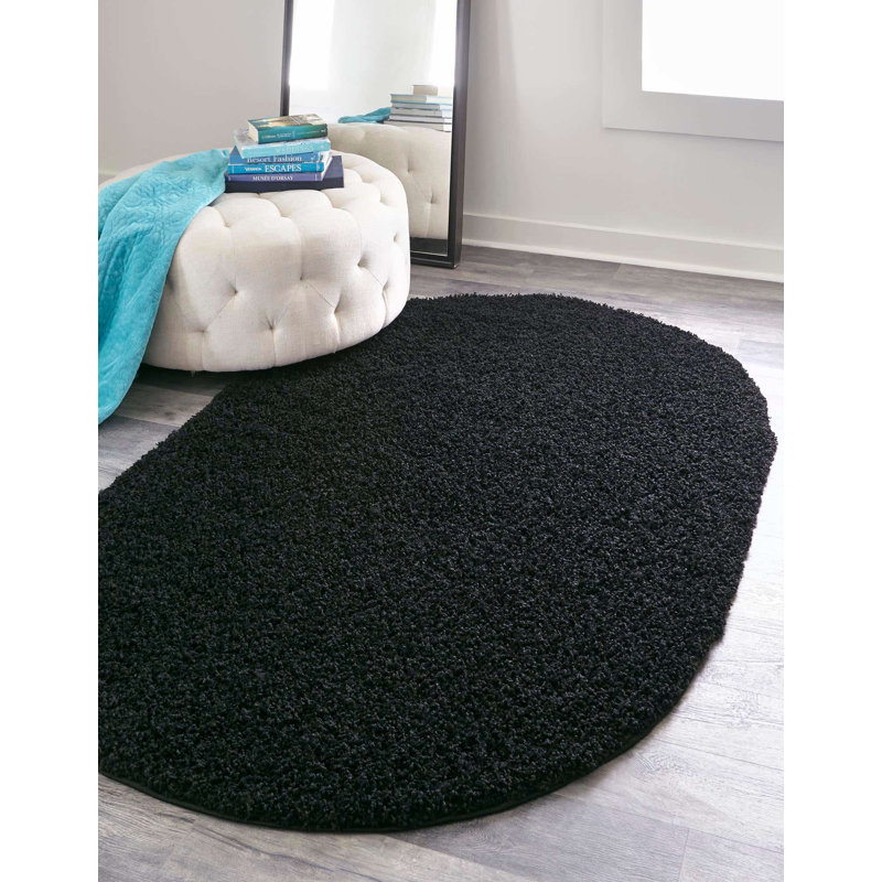 Ebern Designs Santoshi Performance Jet Black Rug & Reviews | Wayfair