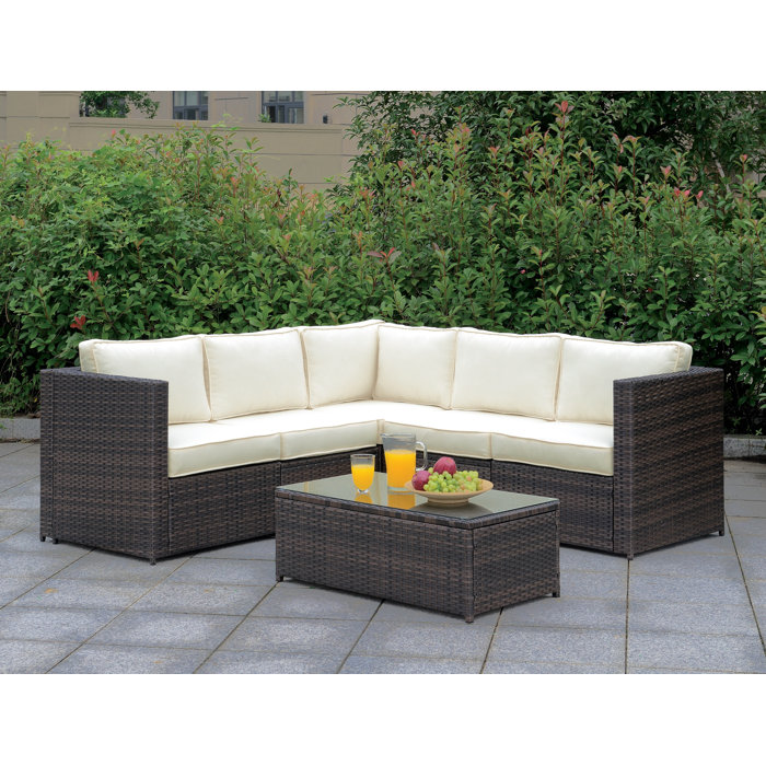 Ebern Designs Morrell Patio Sectional with Cushions & Reviews | Wayfair