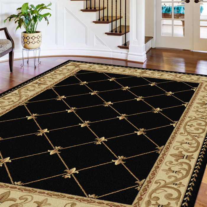 Astoria Grand Clarence Performance Black/Gold Rug & Reviews | Wayfair