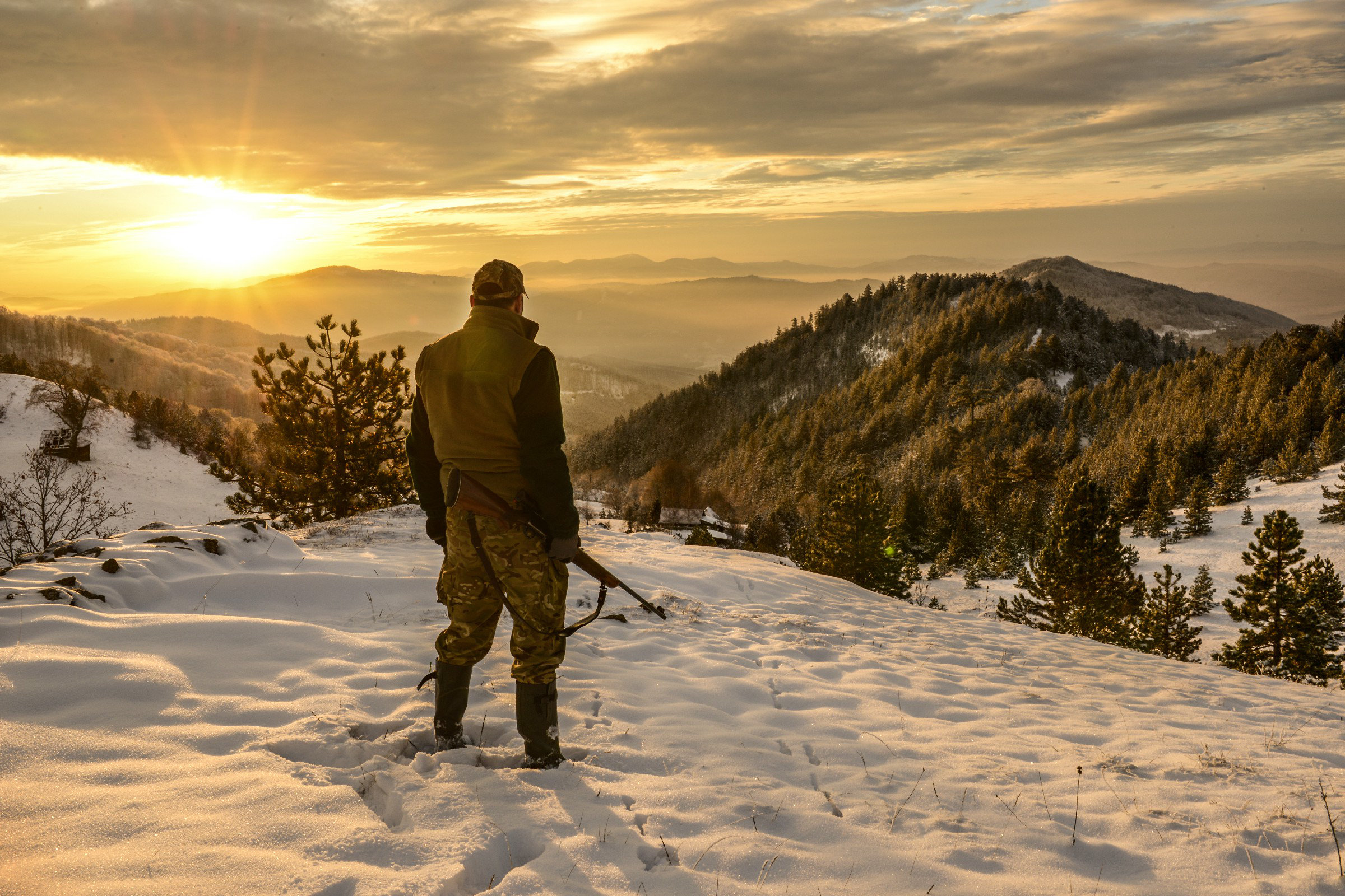 Millwood Pines Hunter Standing On Mountain by - Wrapped Canvas ...