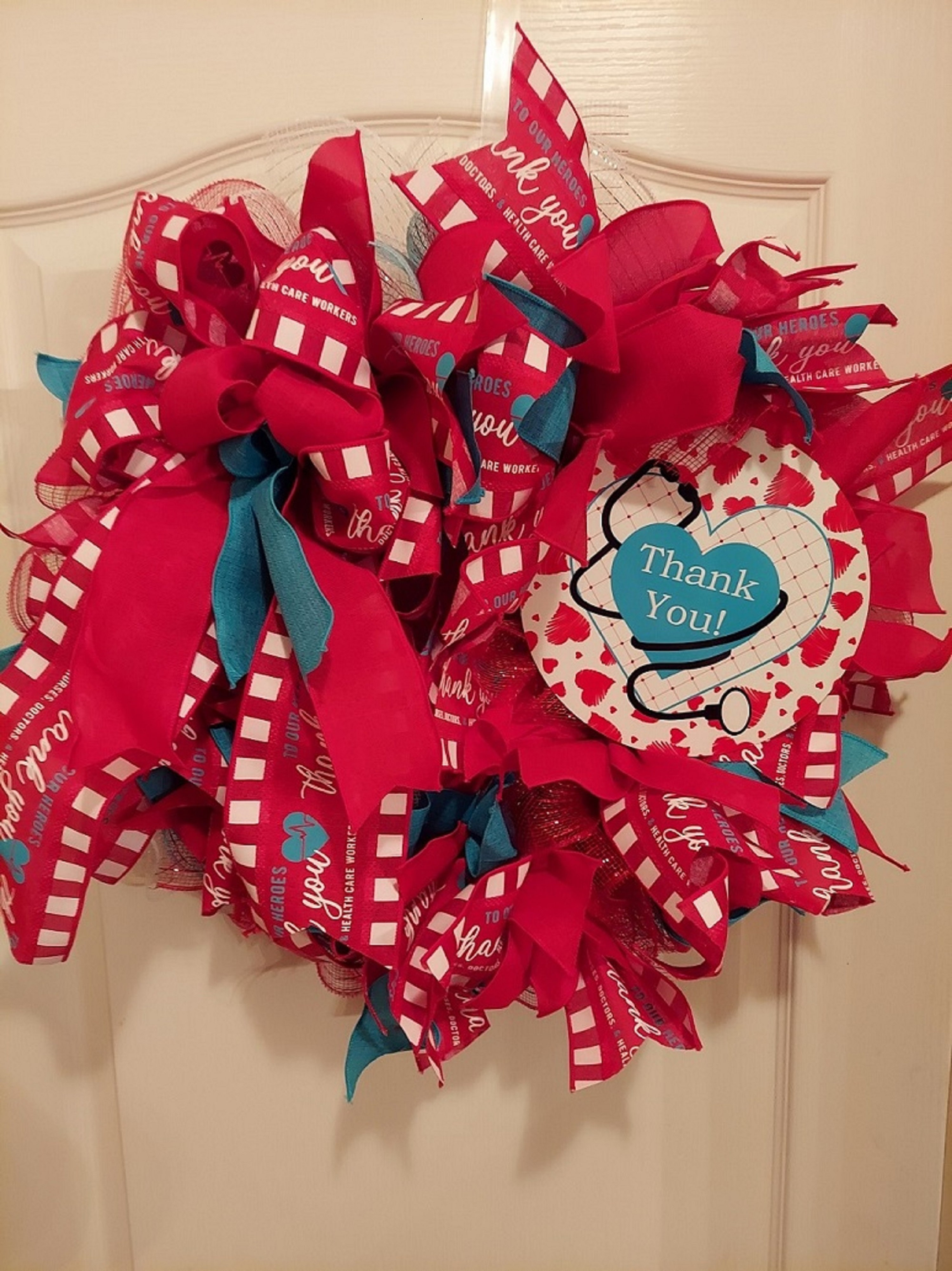The Holiday Aisle® Healthcare Wreath Handcrafted Faux 21'' Wreath | Wayfair